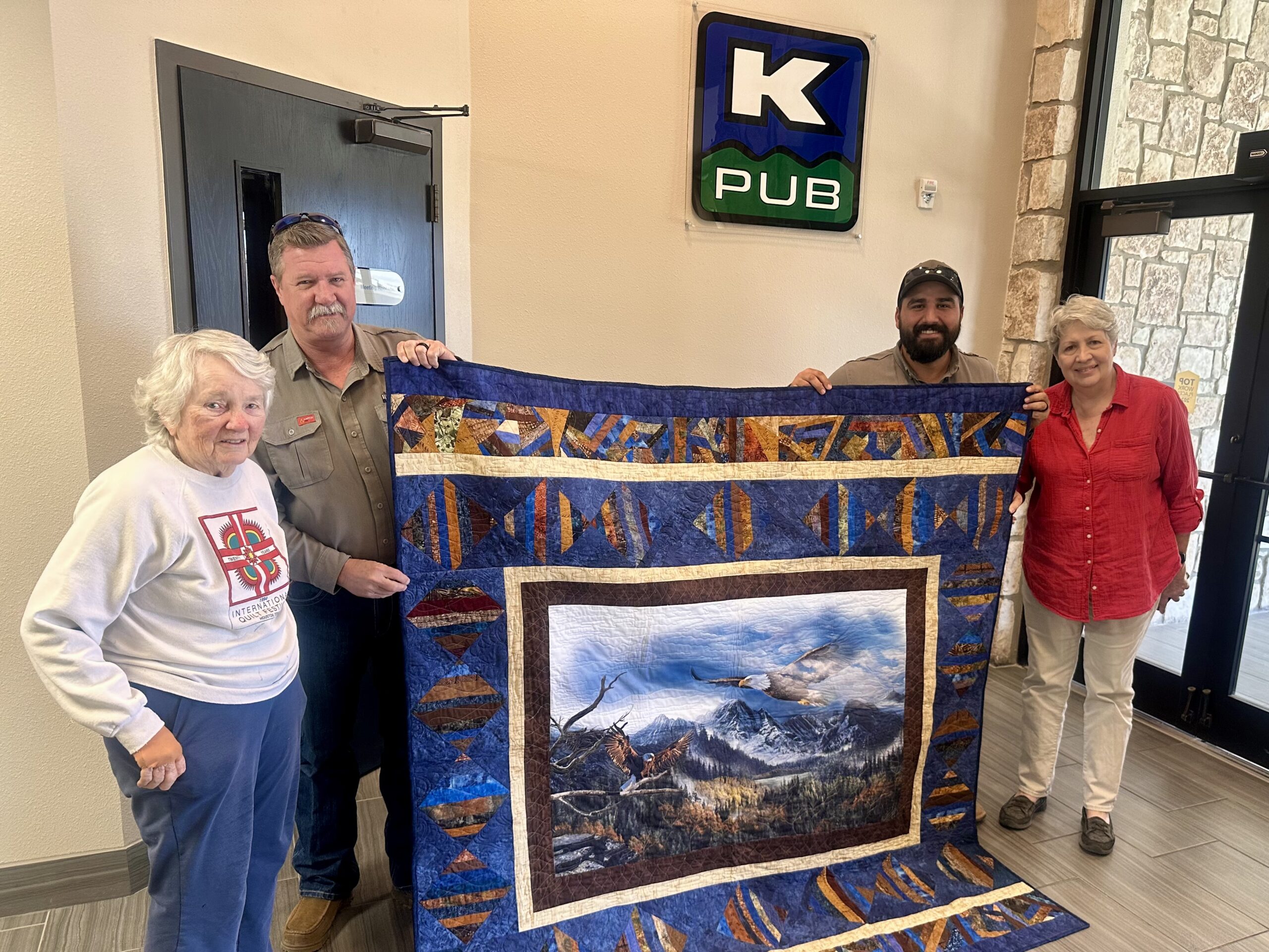 The Giver Connection Honors KPUB Lineman with Handmade Quilt for ...